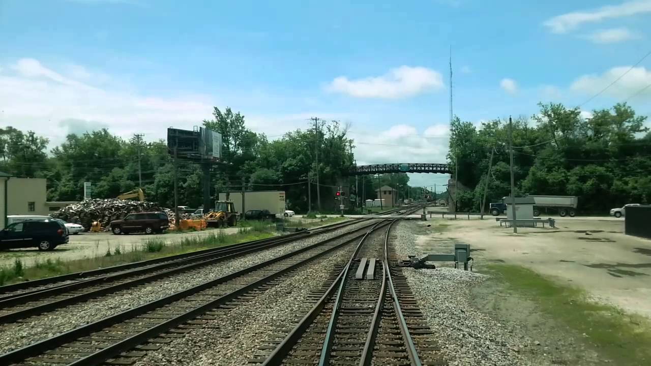 Two WSOR freights meeting at Rondout, IL in daylight 6/20/2014 - YouTube