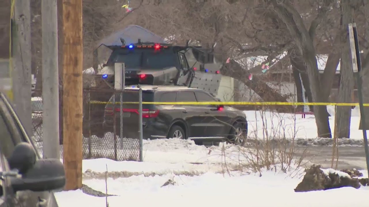 Gary police officer shot; 1 suspect in custody and other at-large - YouTube