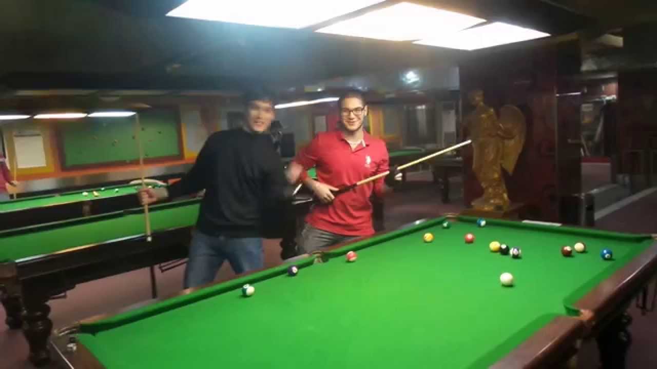 kicking a pool ball with leg - YouTube