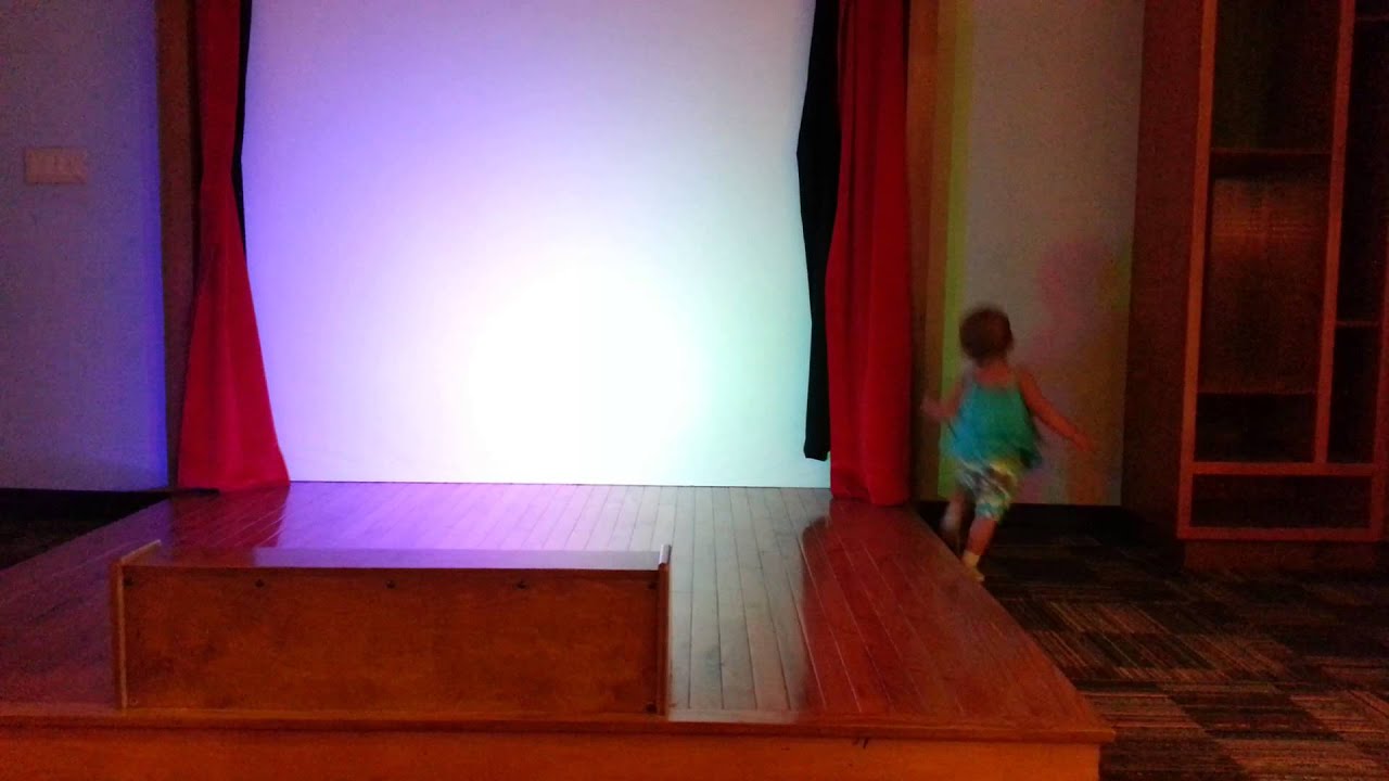 Little girl falls off stage - YouTube