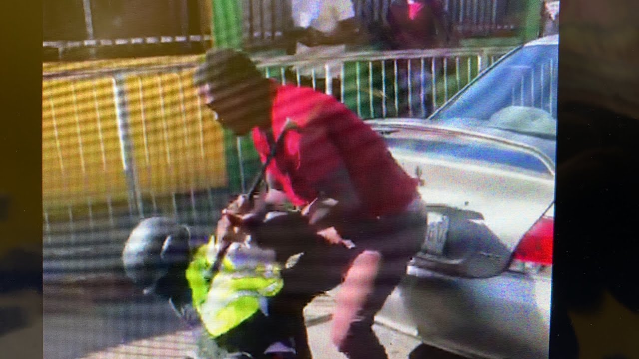 JCF police and man wrestling, man flick police , police draw gun to ...
