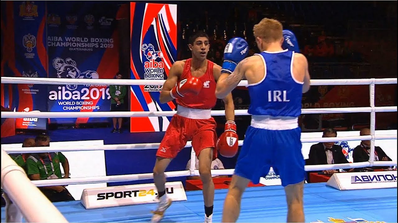 Round of 16 (57kg) BASRAN Eric Robin (CAN) vs WALKER Kurt (IRL) /AIBA ...