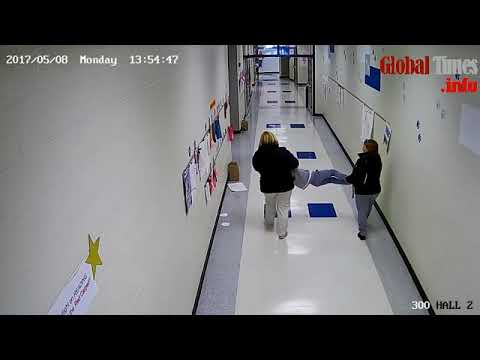 Teacher and aide DRAG autistic boy, 7, down the hall - YouTube