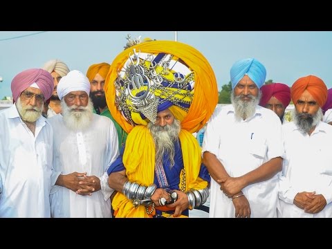 Is This The World's Largest Turban? Man Wears 100lb, 645m Long Headdress