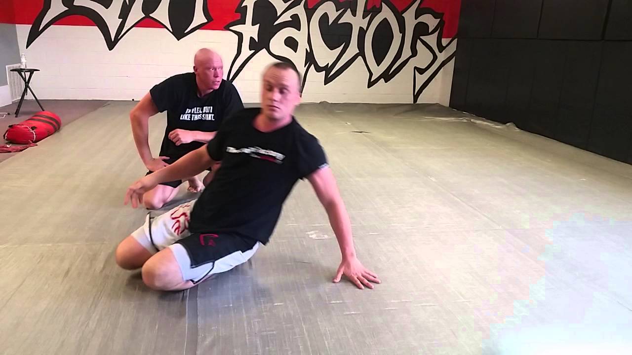 Getting to your feet with a headlock - YouTube