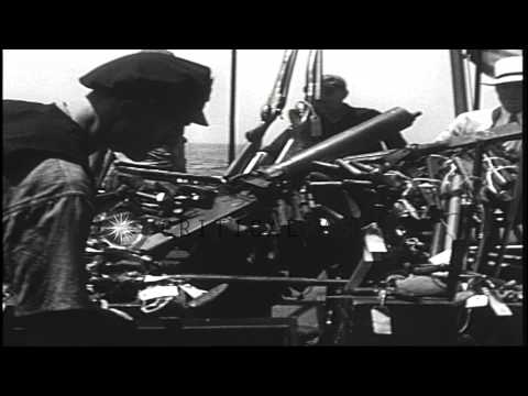 Policemen dump guns into the ocean off Sandy Hook, New Jersey. HD Stock Footage