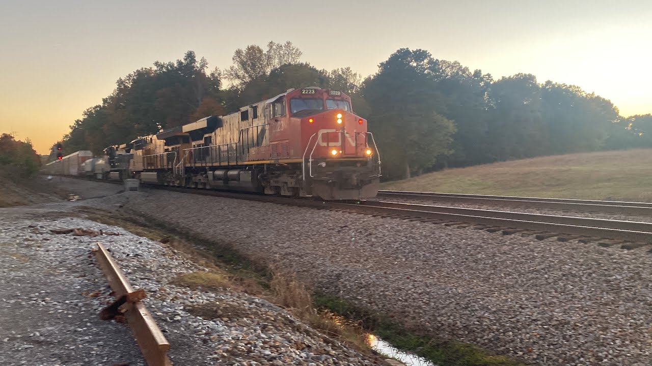 CN 2223 (EF-64) (marker lights on)leads NS 142 - YouTube