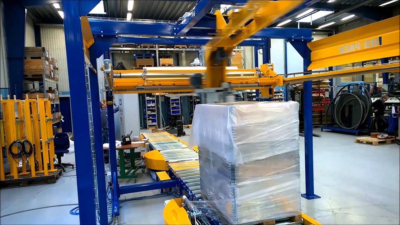 Reo-Pack Wrapping Machine with Top Sheet - YouTube