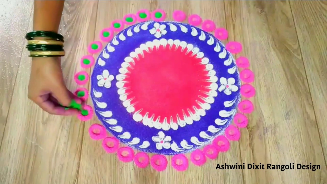 Circle Rangoli Designs with colours / How to make rangoli designs with ...