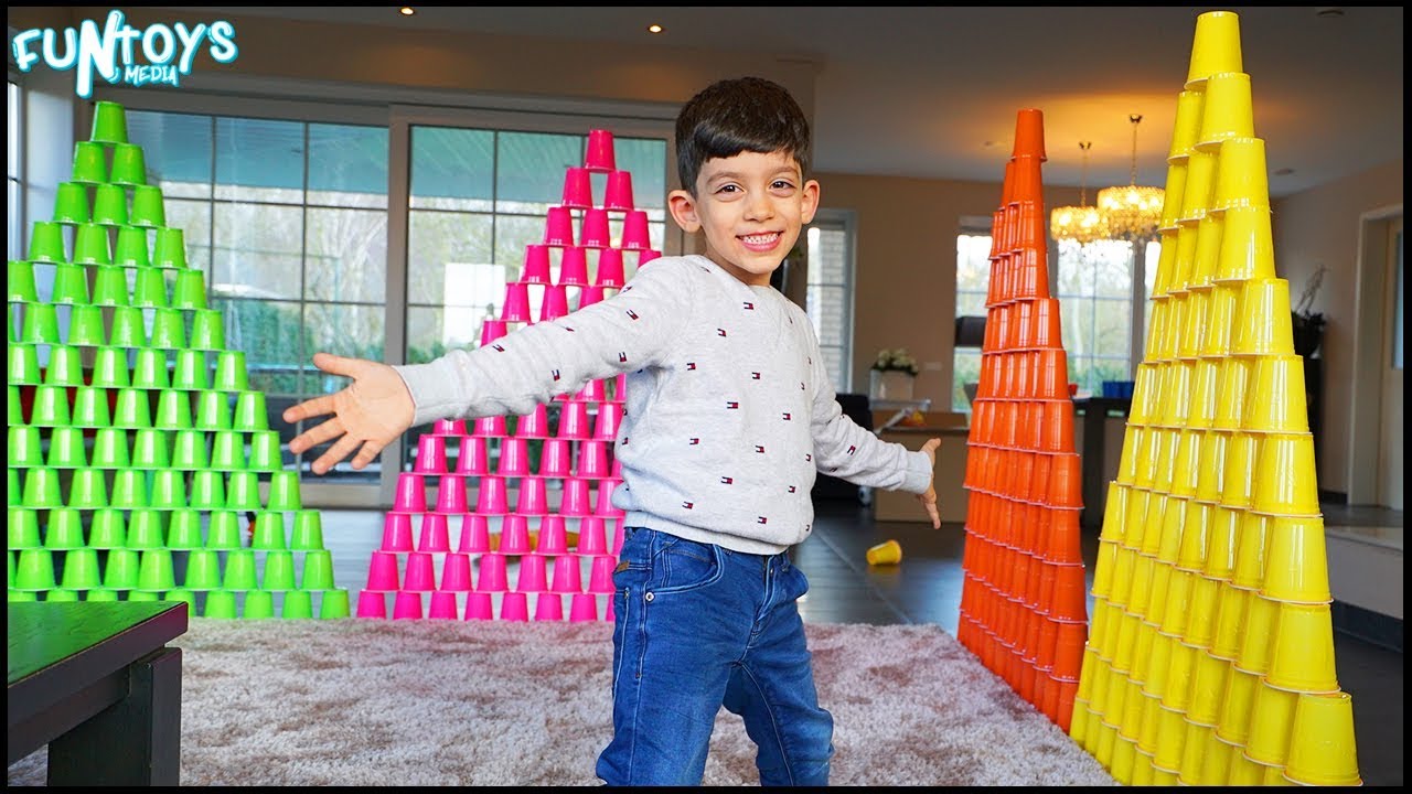 Jason Makes Huge Cup Pyramids for Fun! - YouTube