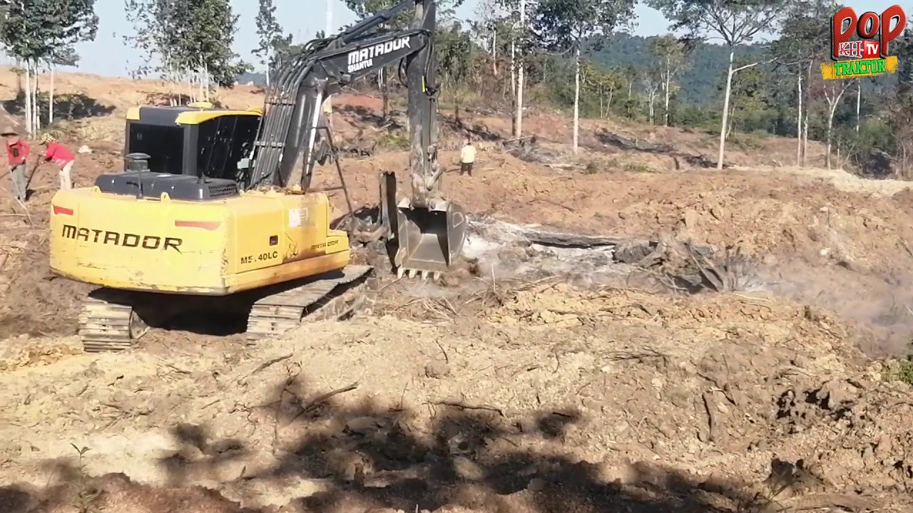 Excavator video #01 Excavator working forest land near the mountains ...
