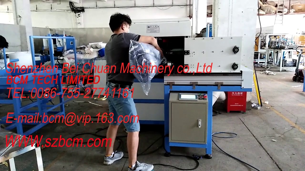 Quilt rolling packing machine - YouTube