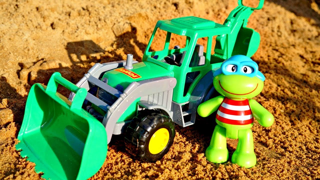 Quaky et les jeux de sable à la plage - perte du râteau - YouTube