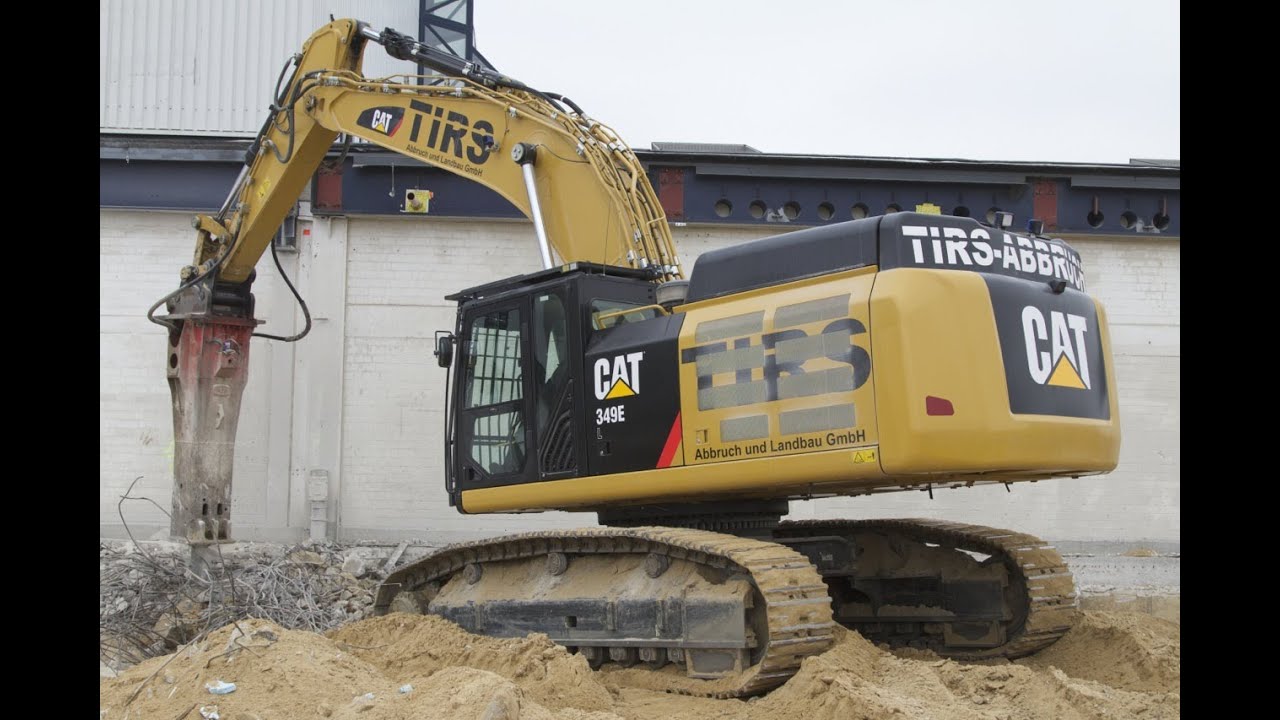 Cat 349 E mit 7,5 Tonnen Montabert Hydraulikhammer (HD) - YouTube