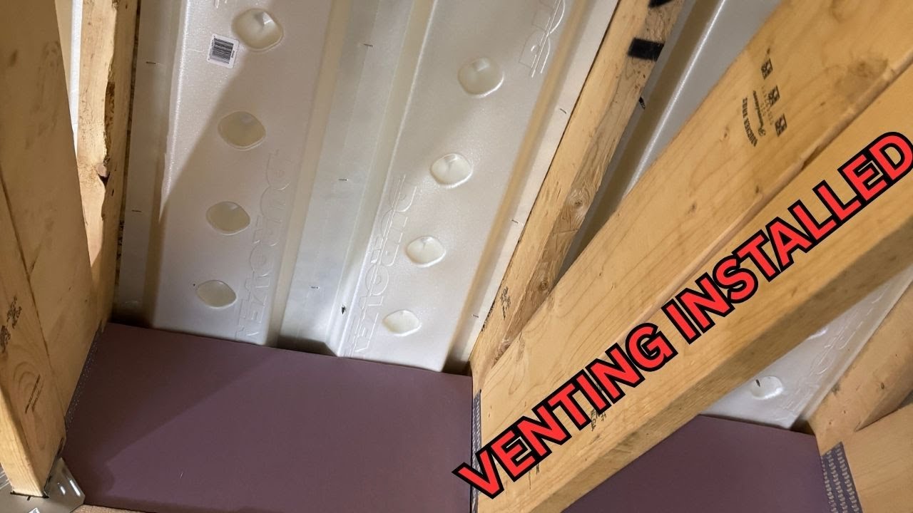 Working in the rafters installing air flow vents and blocking - YouTube