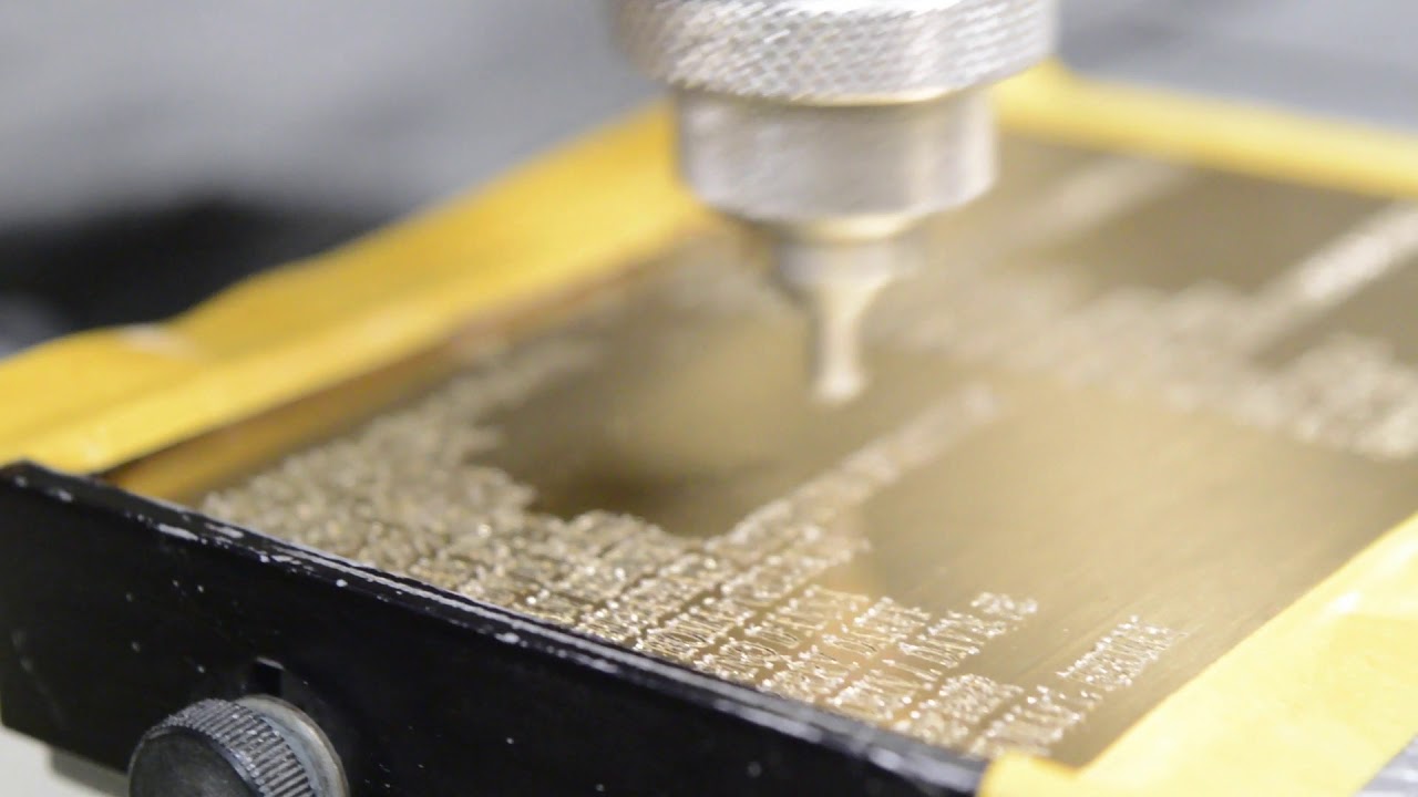 Diamond drag engraving on a brass plate - YouTube