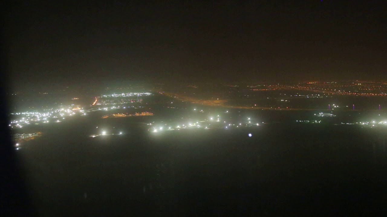 Late night landing at Hamad International, Doha aboard a Qatar Airways ...