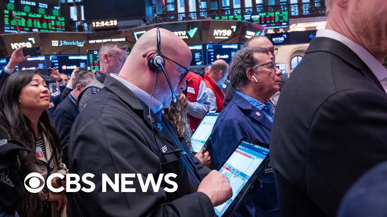 Dow hovering near 40k mark after record-breaking week on Wall Street ...