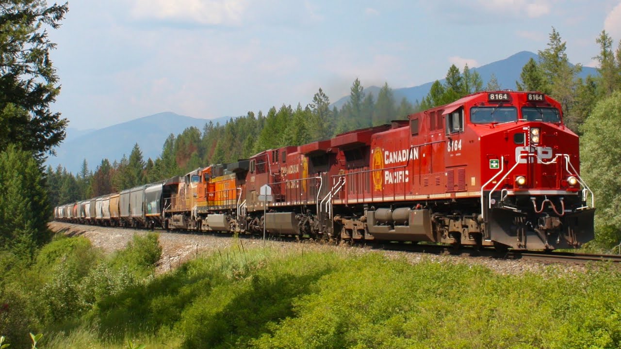RARE!!!! UP & BNSF!!! CP 8164, CP 8621, BNSF 4679 & UP 5500 lead CP 368 east at Caithness, BC ...