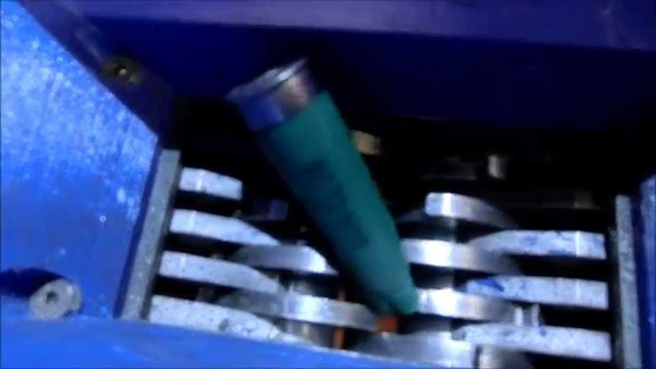 Shredding shotgun shells for recycling purpose - YouTube