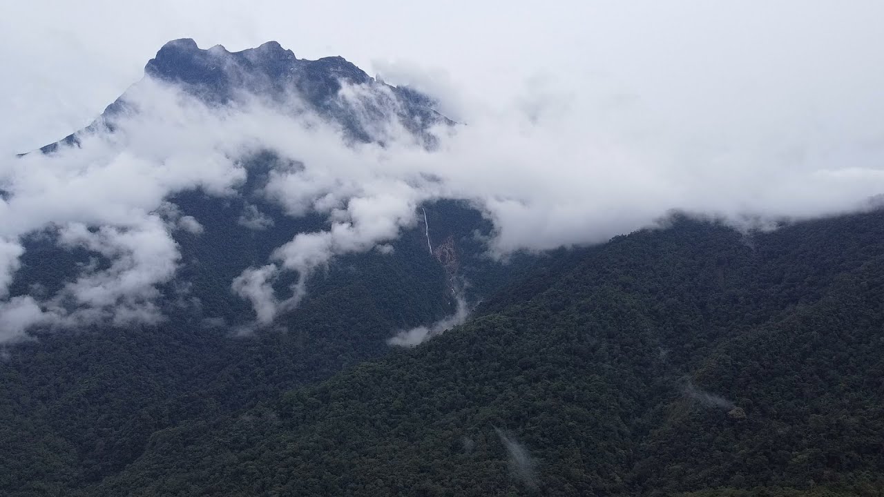 Drone's eye view of Mount Kinabalu waterfall from Mopuk Sopuk cafe ...