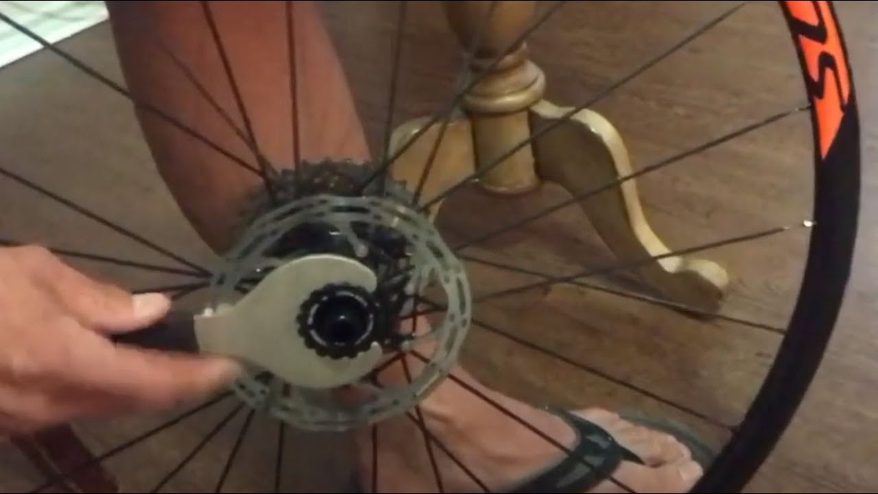 Bicycle disc rotor removal and install - YouTube