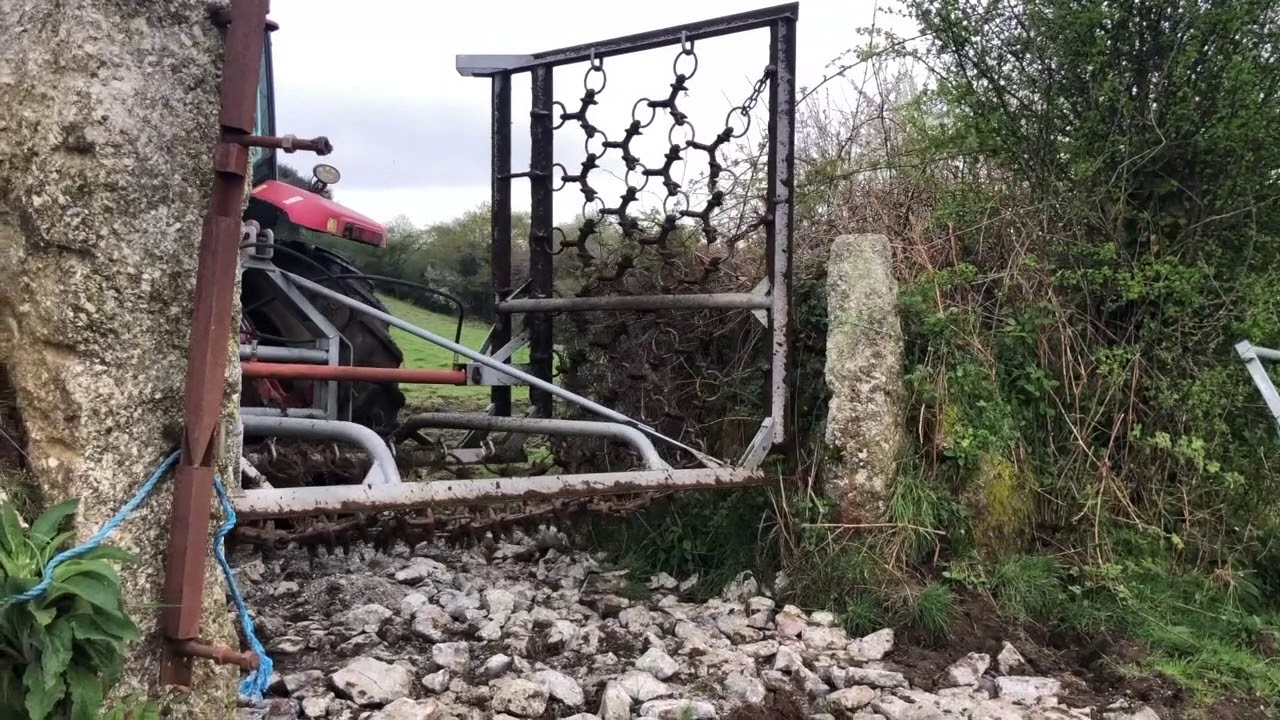 Chain Harrowing the fields - YouTube
