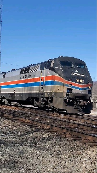 Amtrak #130 Phase II heritage unit leads the eastbound Pennsylvanian at Lewistown, PA (04/03 ...