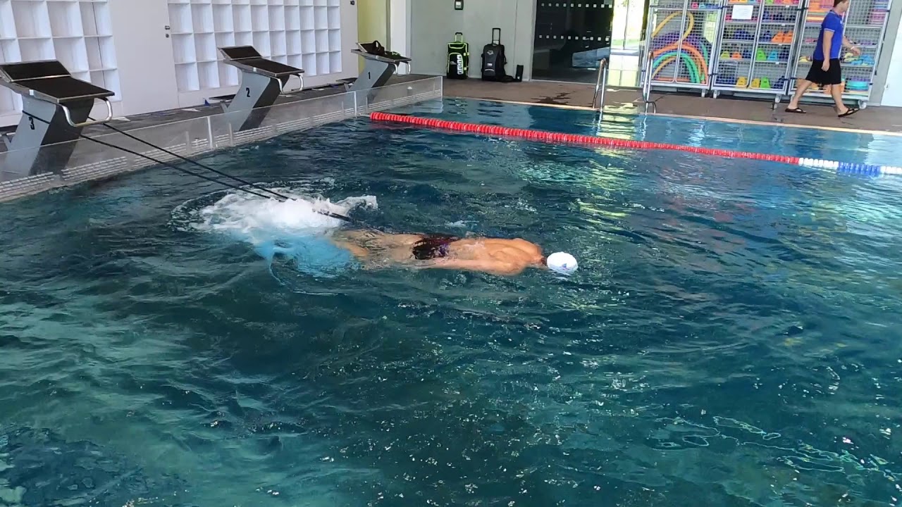 Freestyle flutter kick with arms-down sculling + tether (resistance ...