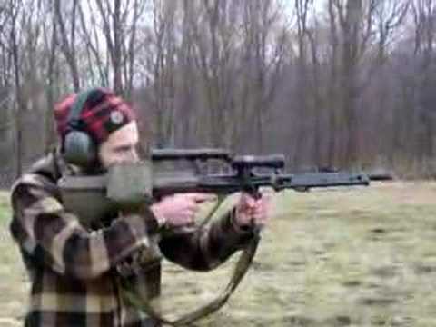 Steyr Aug...SAW / DMR 5.56 / 223 with surefire + brass catcher - YouTube