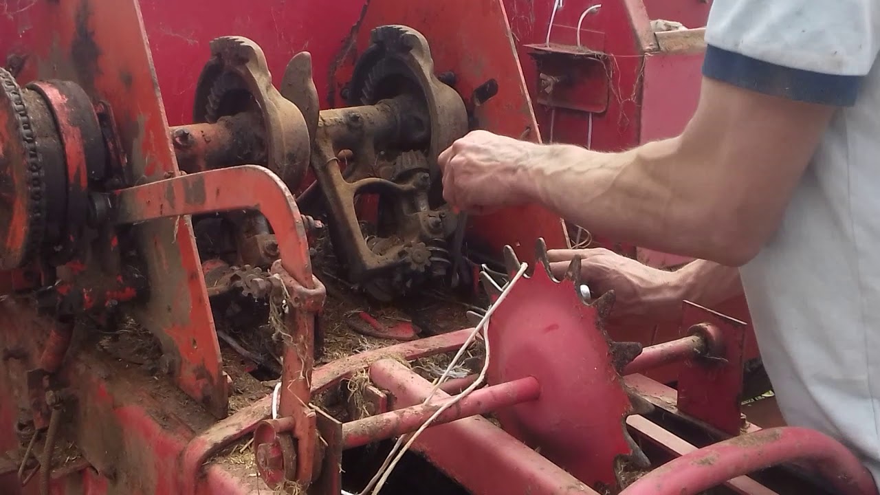jones baler how to lift the knotters for inspection - YouTube