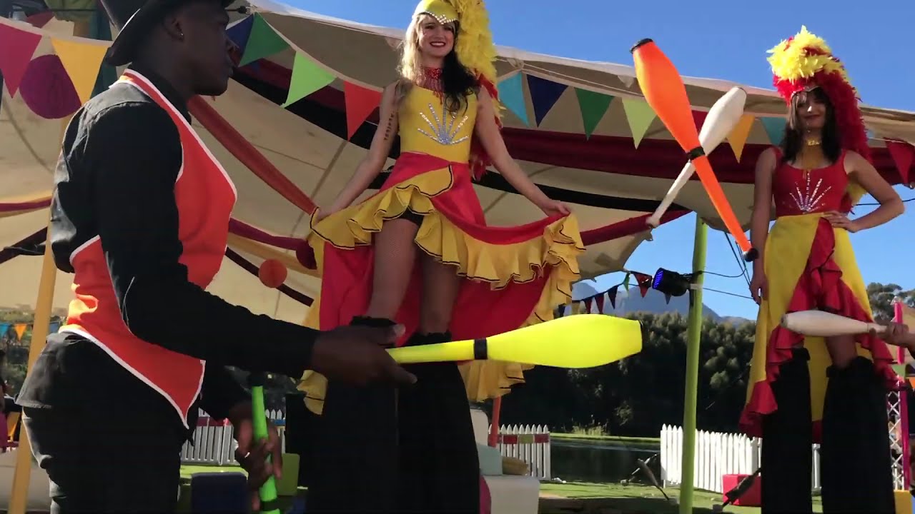 Carnival Stilt Walkers and Jugglers - YouTube