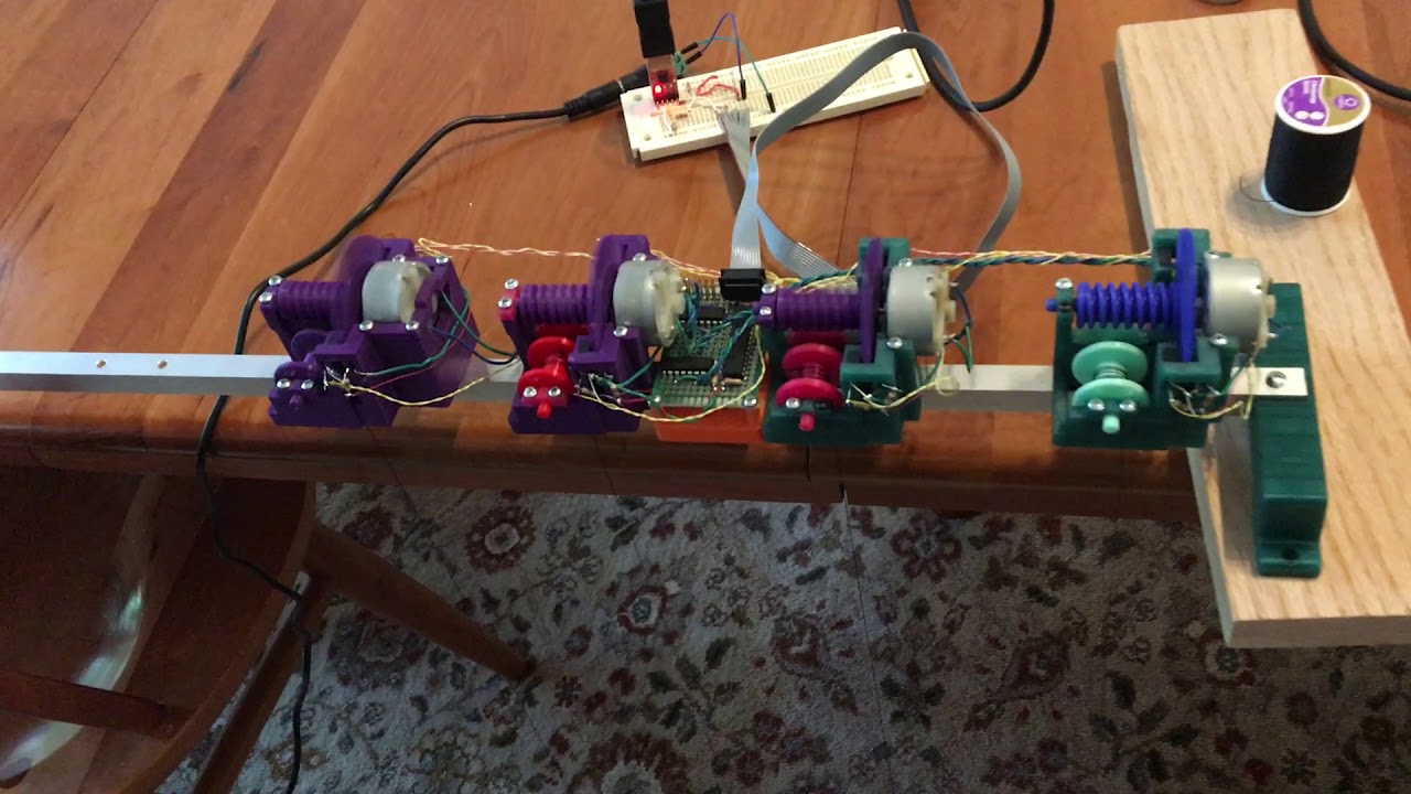 Animated hanging robots prototype - YouTube