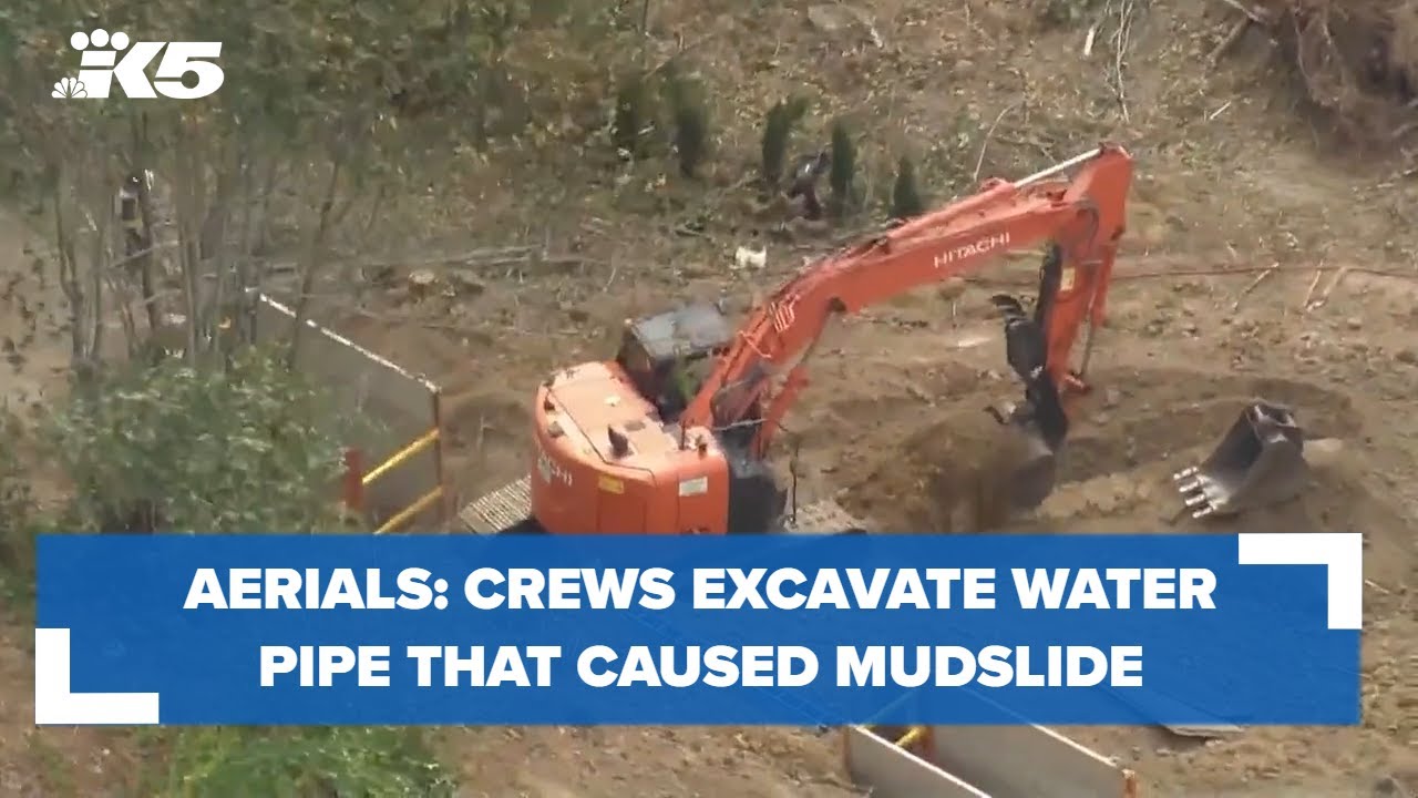Aerials: Crews excavate water pipe that caused mudslide - YouTube