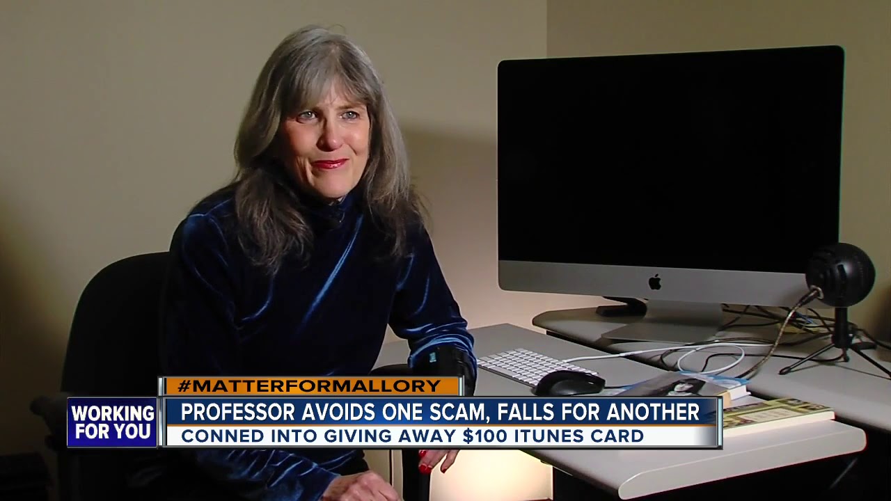 Local professor avoids one scam, falls for another - YouTube