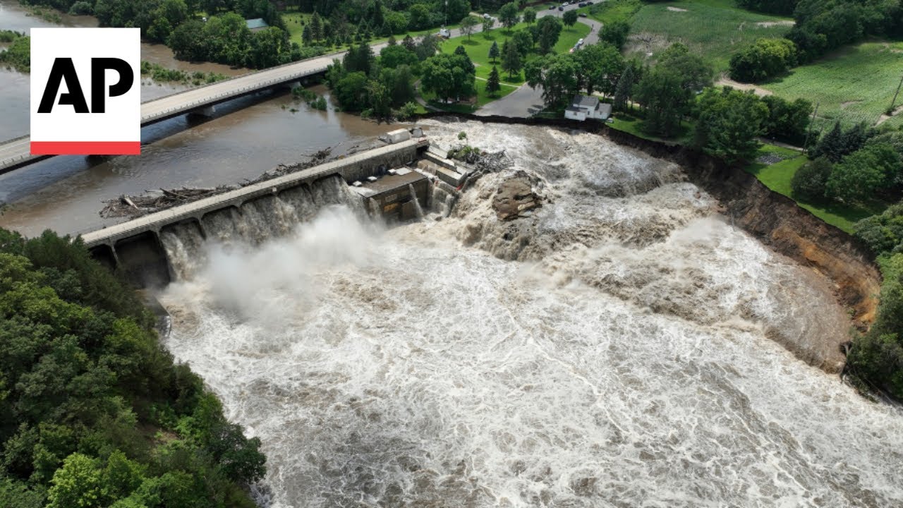 Minnesota dam still standing after floodwaters overcame parts of ...