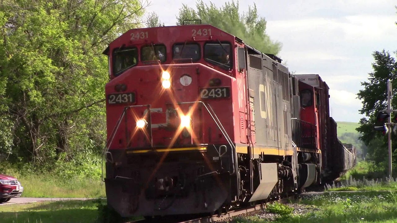 Cowl Dash-8 Leads CN Train 406 East at Hampton, NB - YouTube