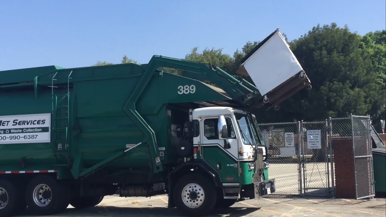 Calmet services front loader trash truck #389 peterbilt 320 - YouTube