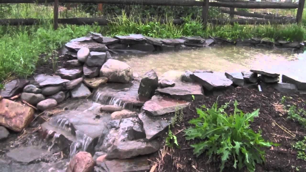 Swales, Ponds, and Spillways in the Rain 2 - YouTube