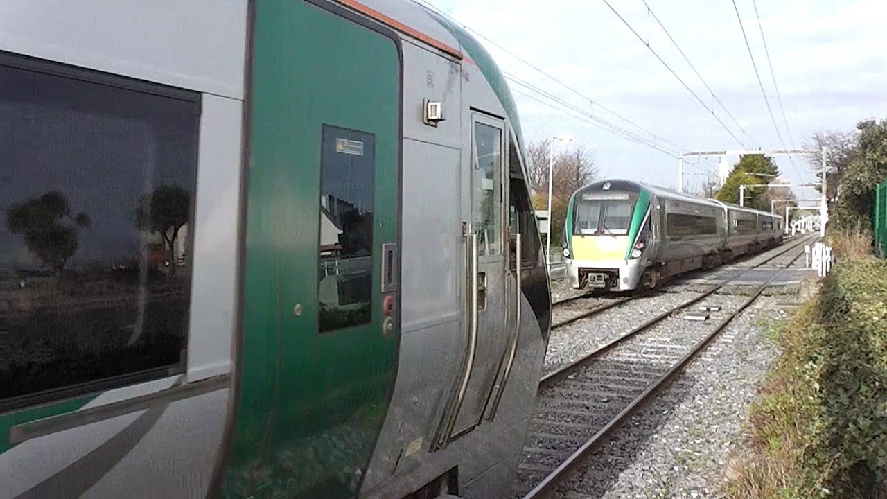 2 x 22000 Class DMU Trains - Merrion Gates Level Crossing - YouTube