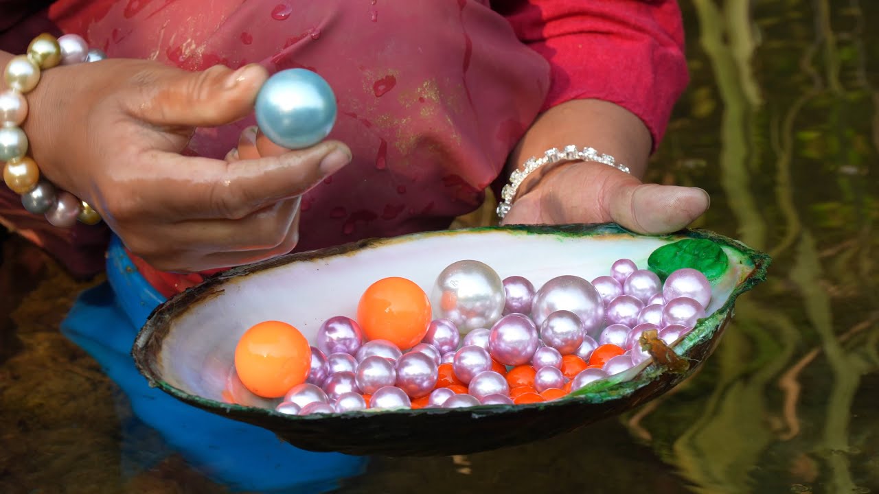 Pry open a sparkling giant clam, which harbors countless beautiful ...