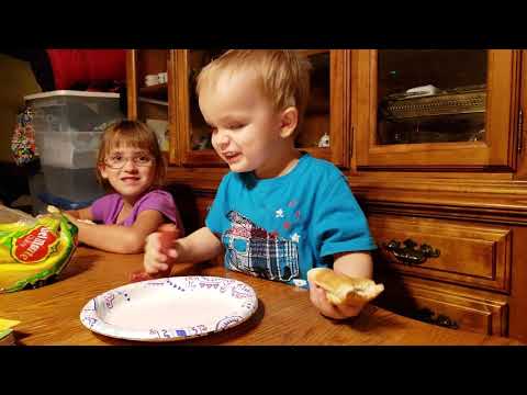 Baby with Hot Dog vs Mom's Dining Room Table