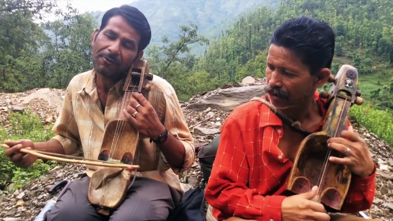 typical sarangi player in nepal - YouTube