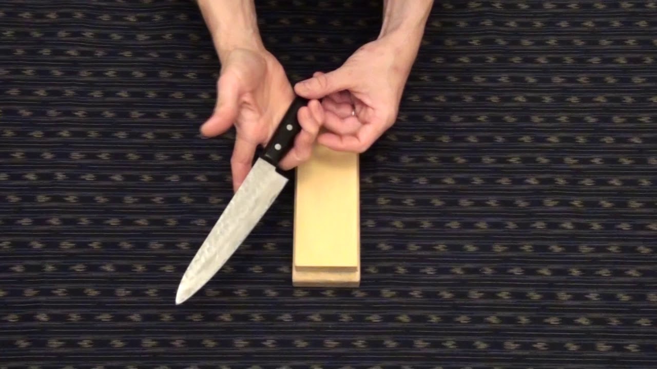 Sharpening a double bevel knife: correct grip - YouTube