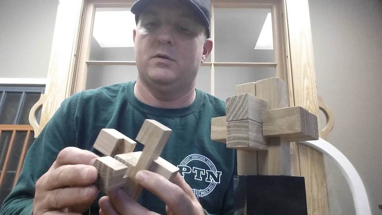 Assembling a 6 piece burr wood puzzle - YouTube