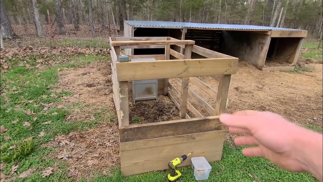 how to build a goat proof dog feeder out of a pallet and scrap wood 4-12-22 lgd jump gate - YouTube