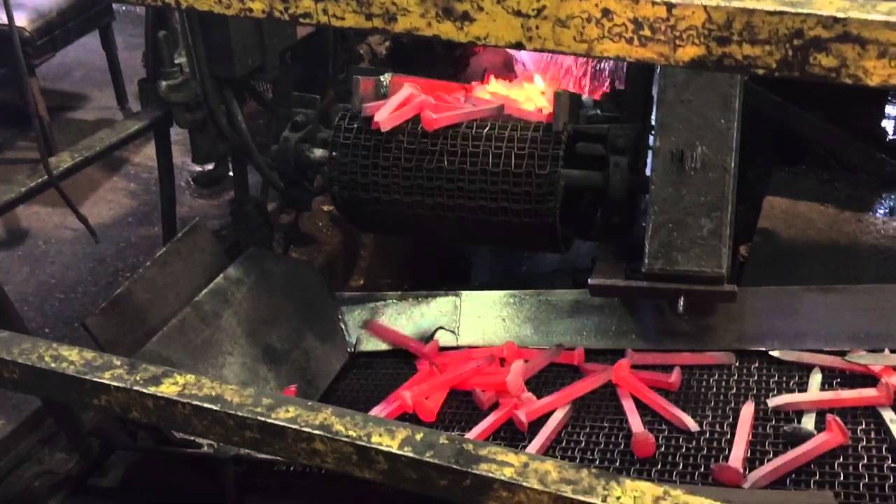 Railroad spike manufacturing - YouTube