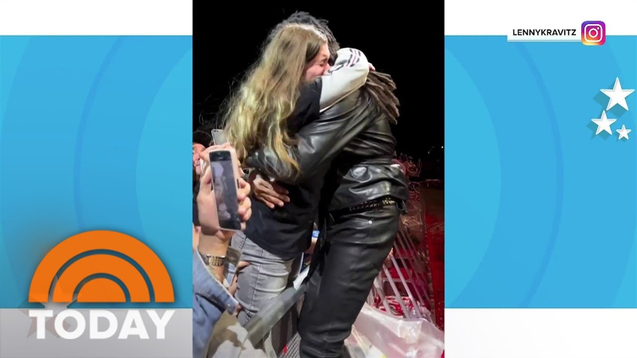 Watch: Lenny Kravitz lifts and hugs crying fan during concert - YouTube