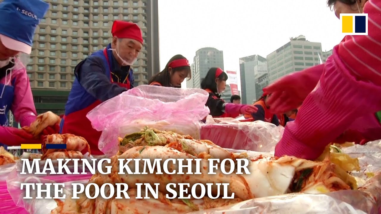 Thousands of people make 35 tonnes of kimchi in South Korea to feed the ...