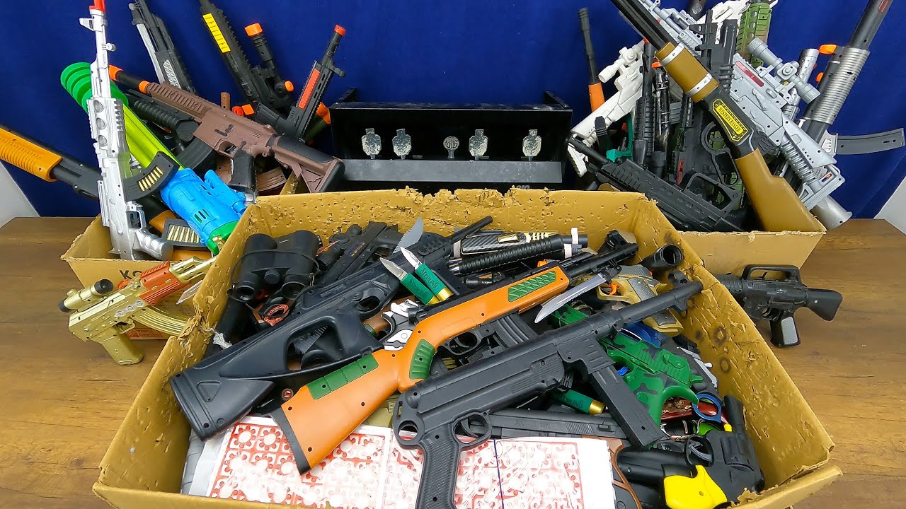 Three Boxes of Toy Rifles And Guns, Sniper Rifles, Karambit Knives ...